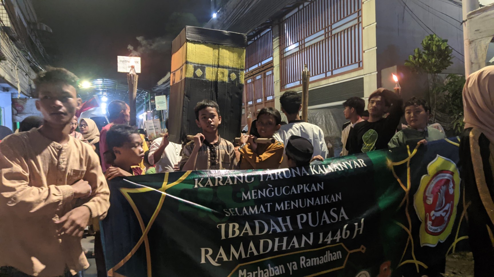 Pelaksanaan Pawai Obor di Kelurahan Kalianyar Jakarta Barat, dalam Rangka Menyambut Bulan Suci ...
